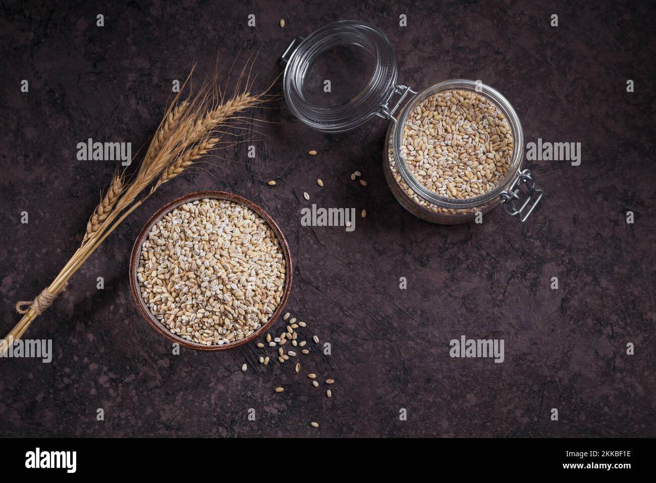 Bowl of raw dried broken pearl barley cereal grain Stock Photo - Alamy
