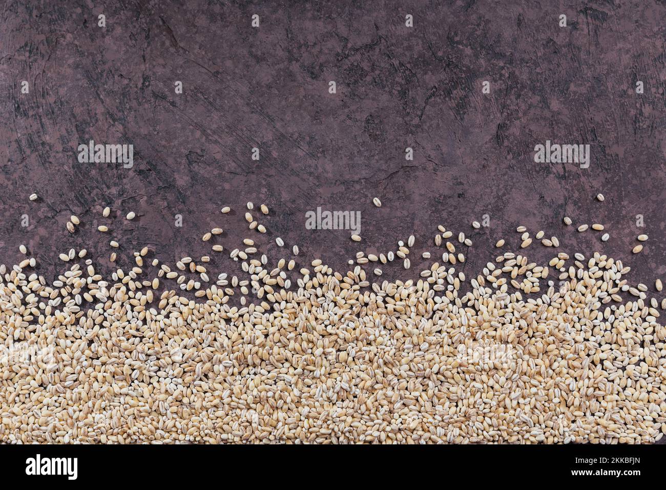 Organic uncooked pearl barley top view Stock Photo - Alamy