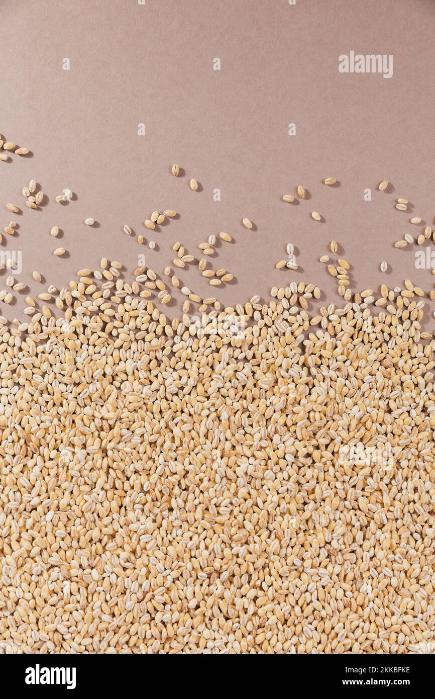 Organic uncooked pearl barley top view Stock Photo - Alamy