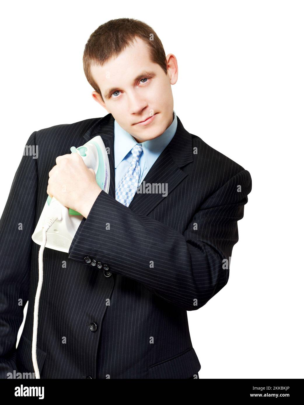 A foppish handsome business person ironing the front of a suit jacket ...