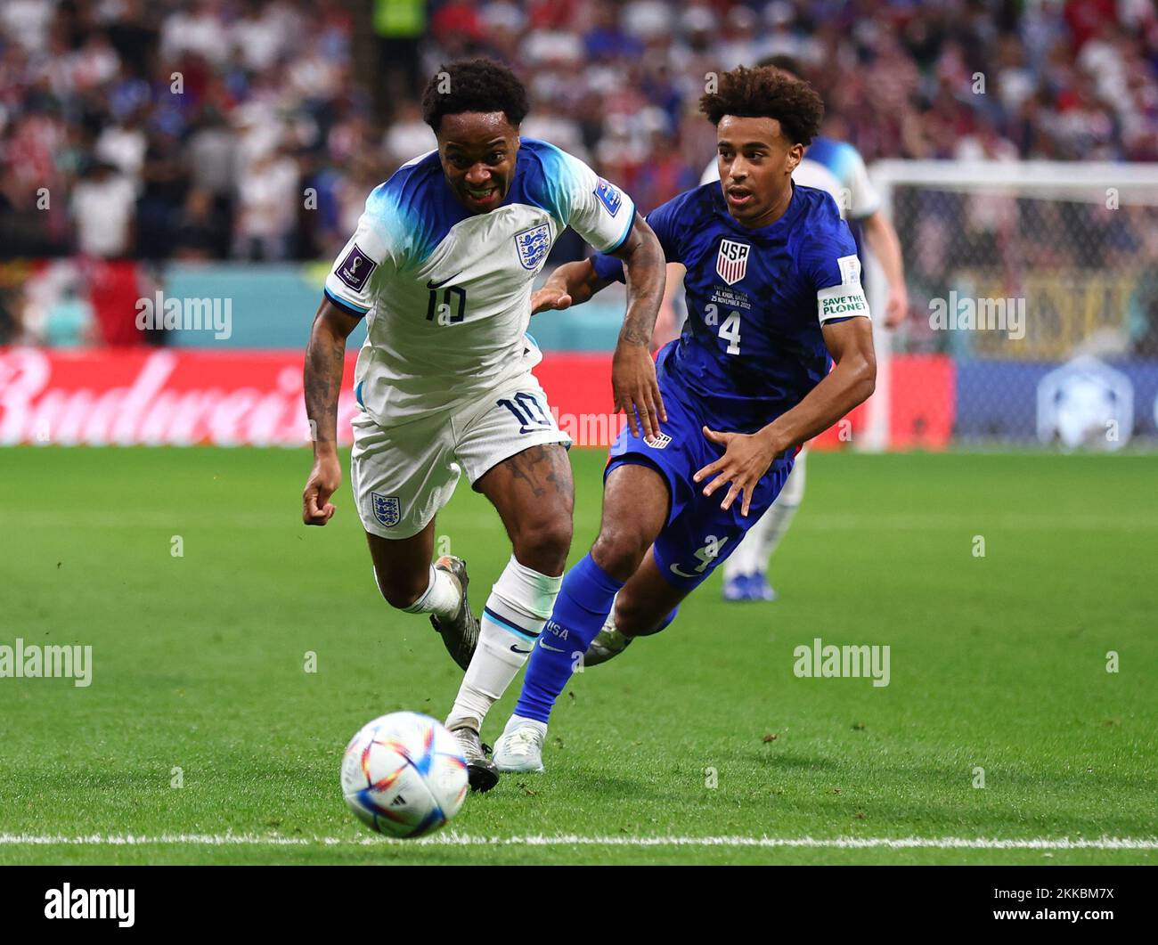 Al Khor, Qatar, 25th November 2022. Raheem Sterling of England beats ...