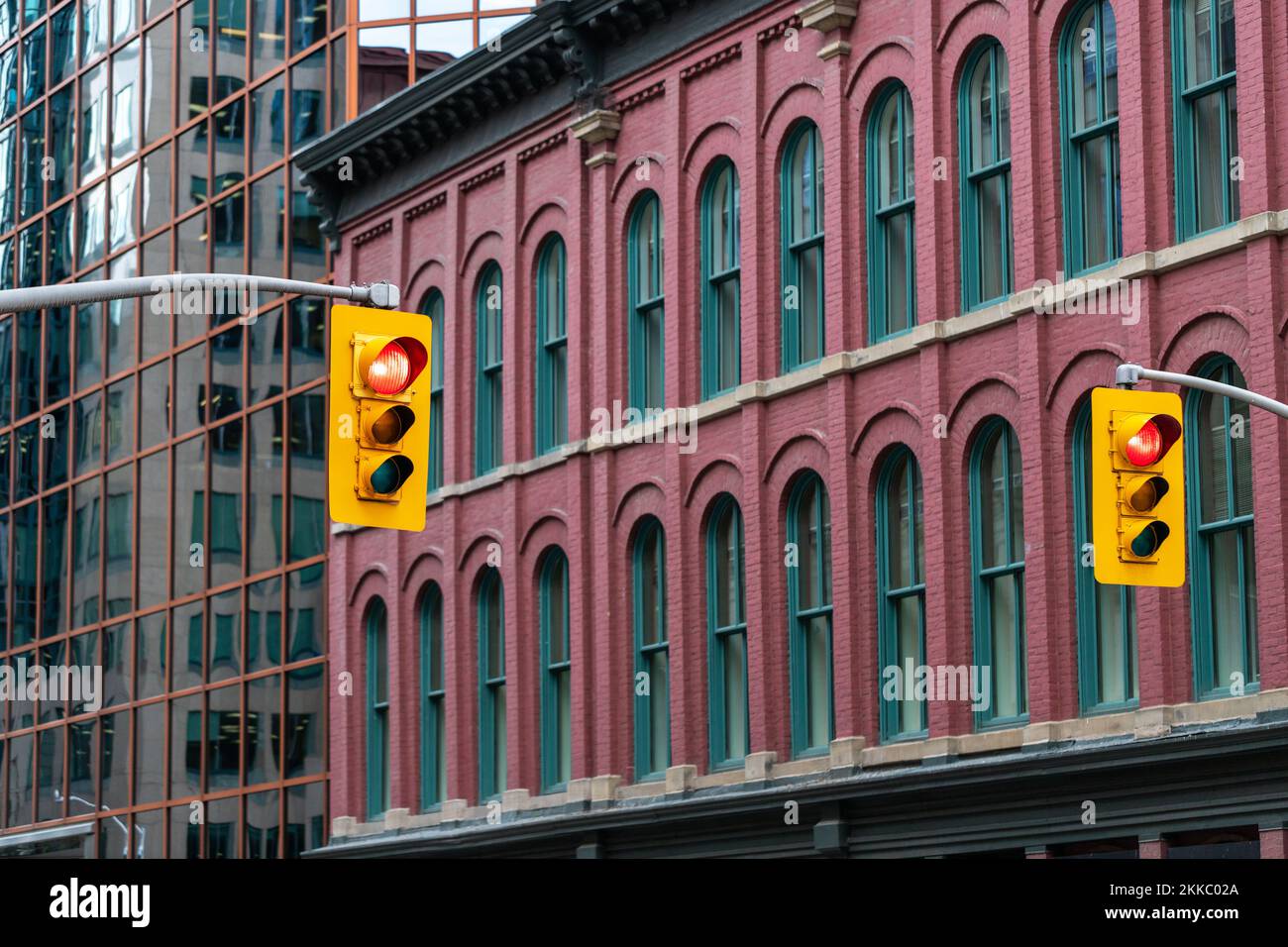 Intersection sign against building hi-res stock photography and images ...