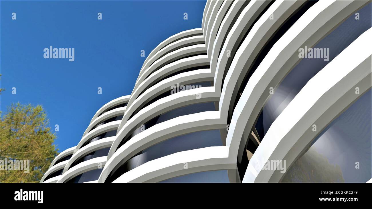 Bottom view of a modern building with a rounded facade. White concrete ...
