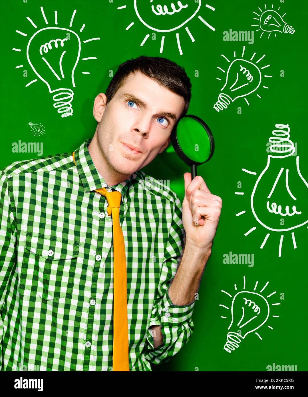 Male Business Person Thinking With Spy Glass To Face In Front Of A ...