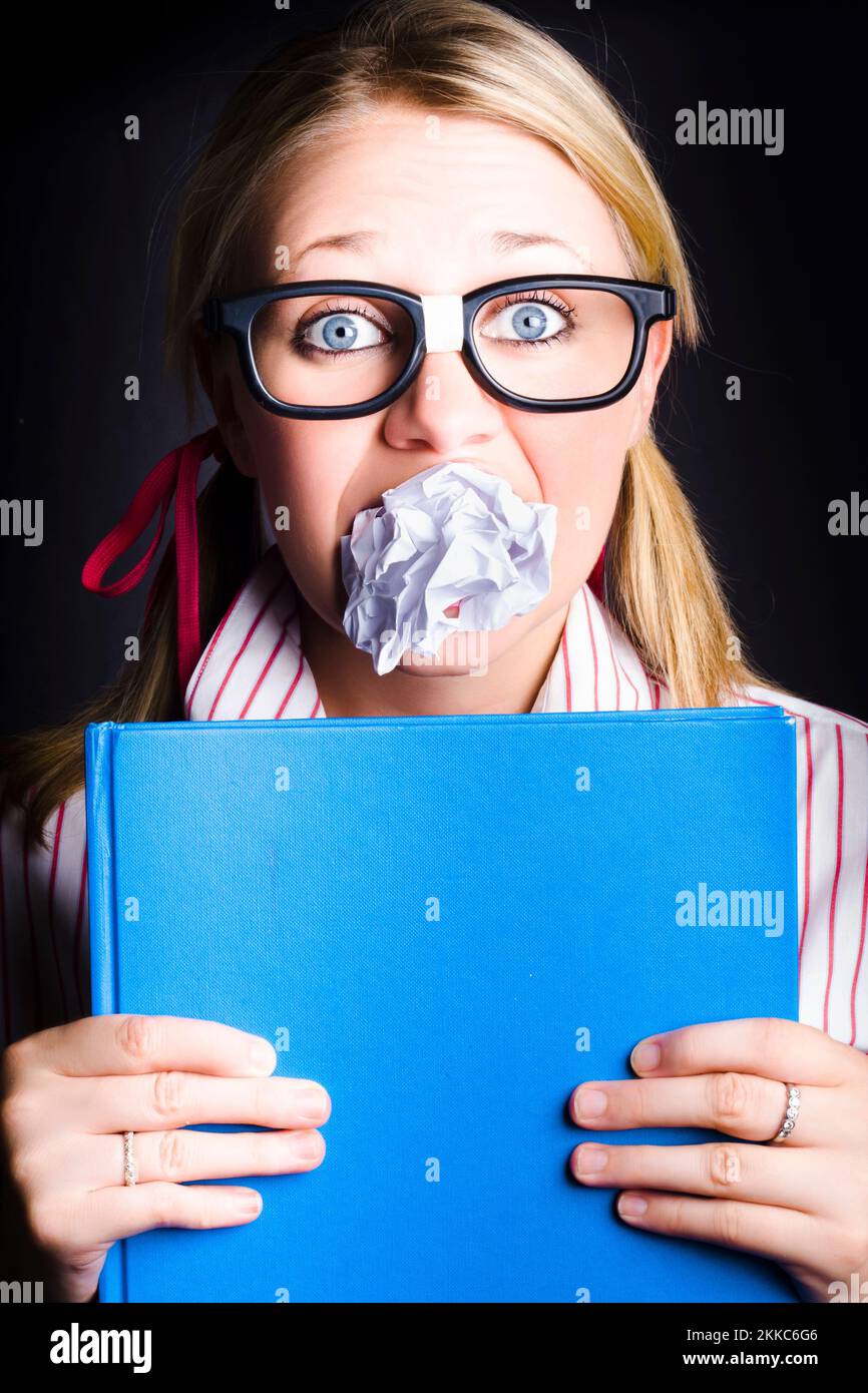 Blue Revision Book Held Tightly In The Hands Of A Terrified And ...