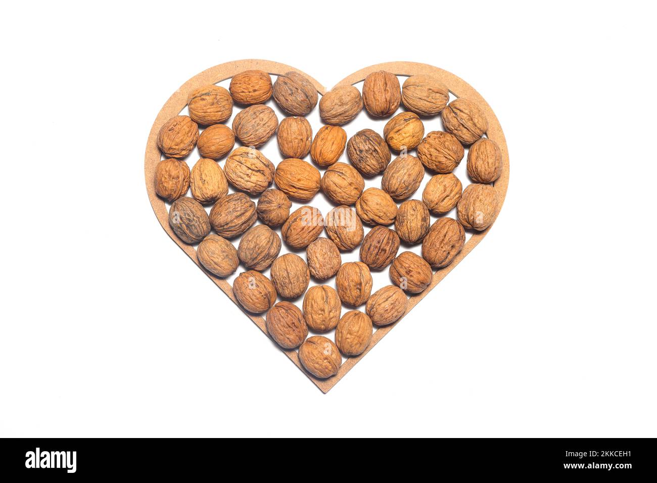 Walnut in heart shape hi-res stock photography and images - Alamy