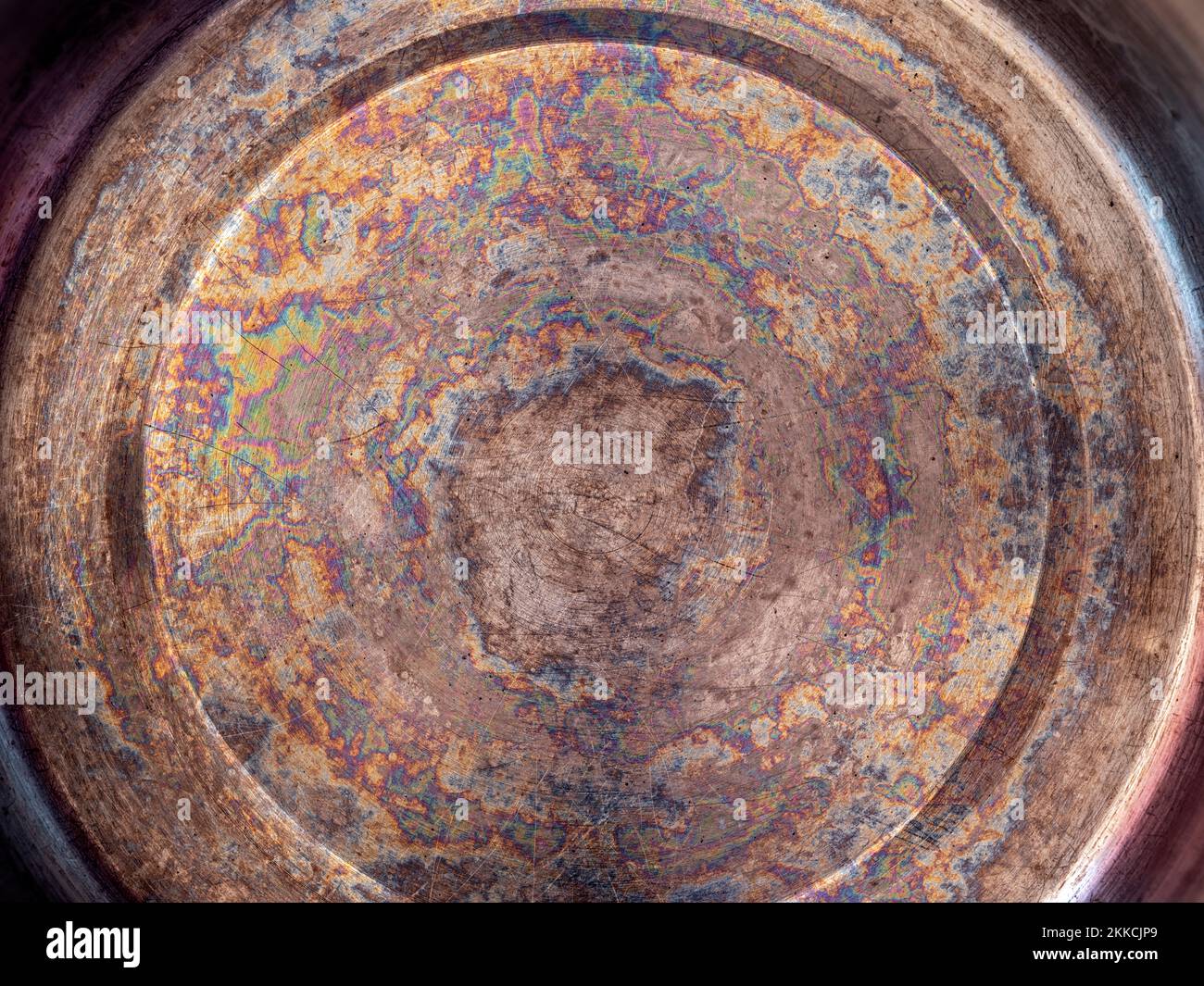 Detail of oil stained bottom of a stainless steel pan Stock Photo - Alamy