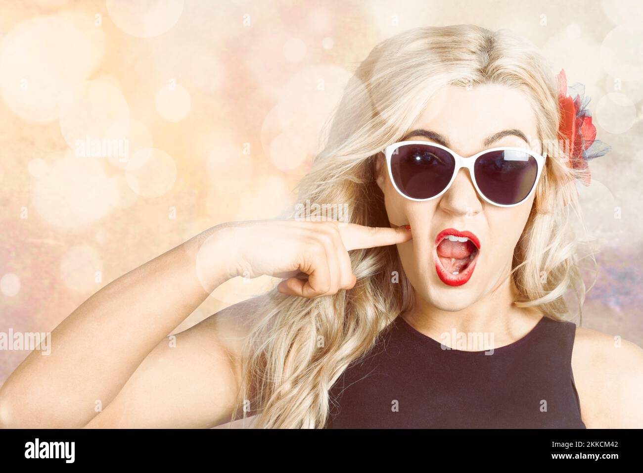 Crazy retro beauty portrait on the face of a surprised pin-up woman ...