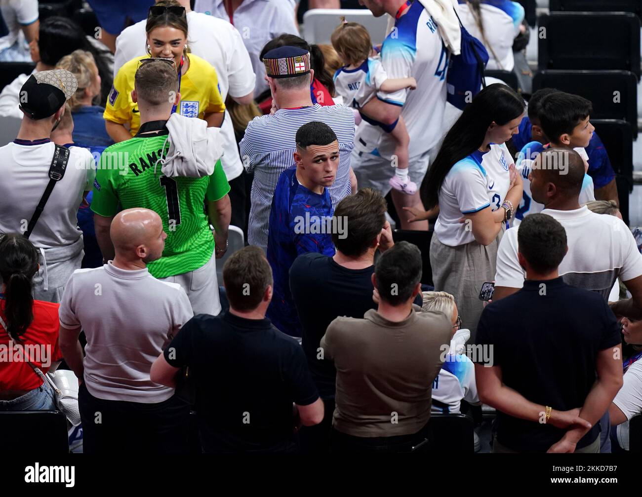 England's Phil Foden (centre) greets friends and family in the stands ...