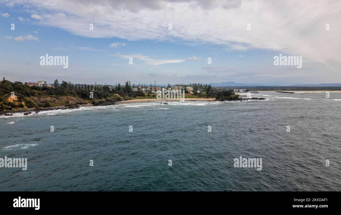 A view of Oxley Beach in Port Macquaire under the half-cloudy sky Stock ...