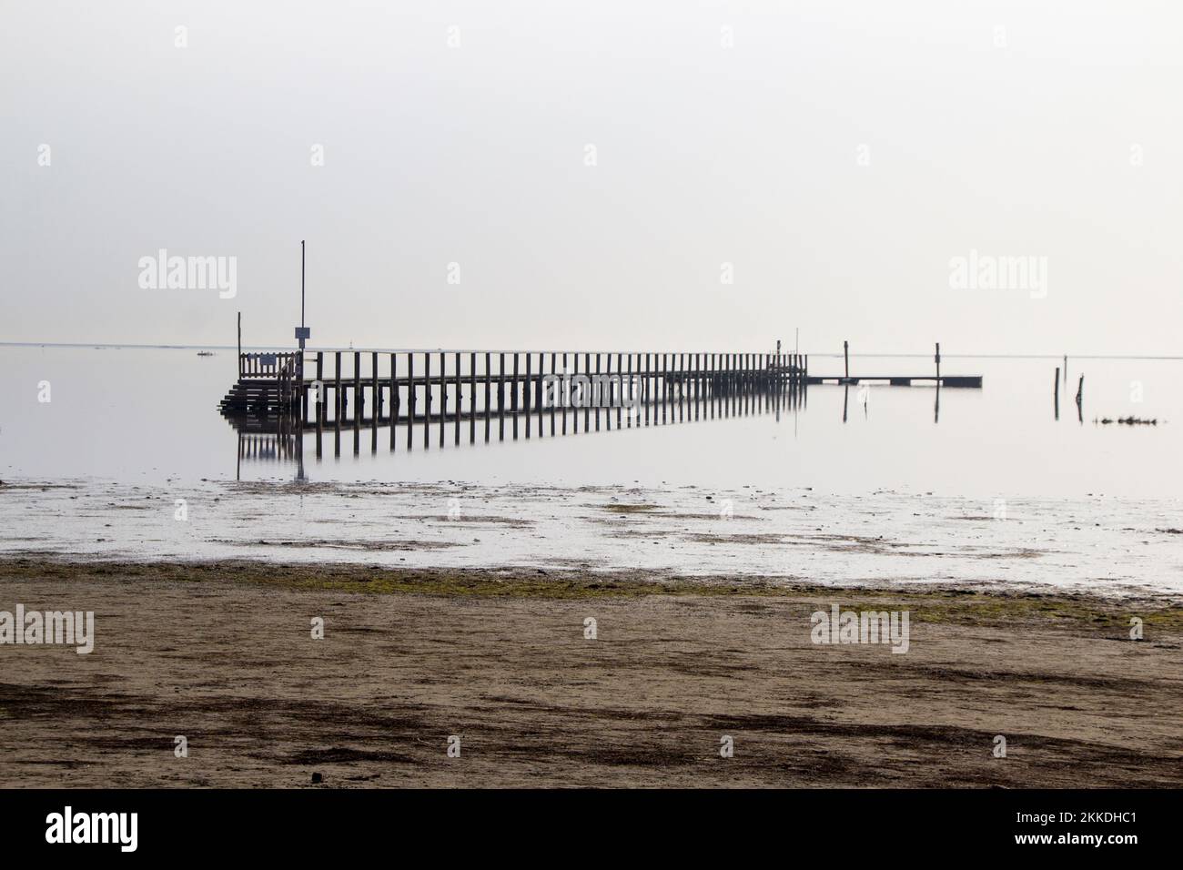 Wooden Pier at Pineta Beach in Grado, Italy Stock Photo - Alamy