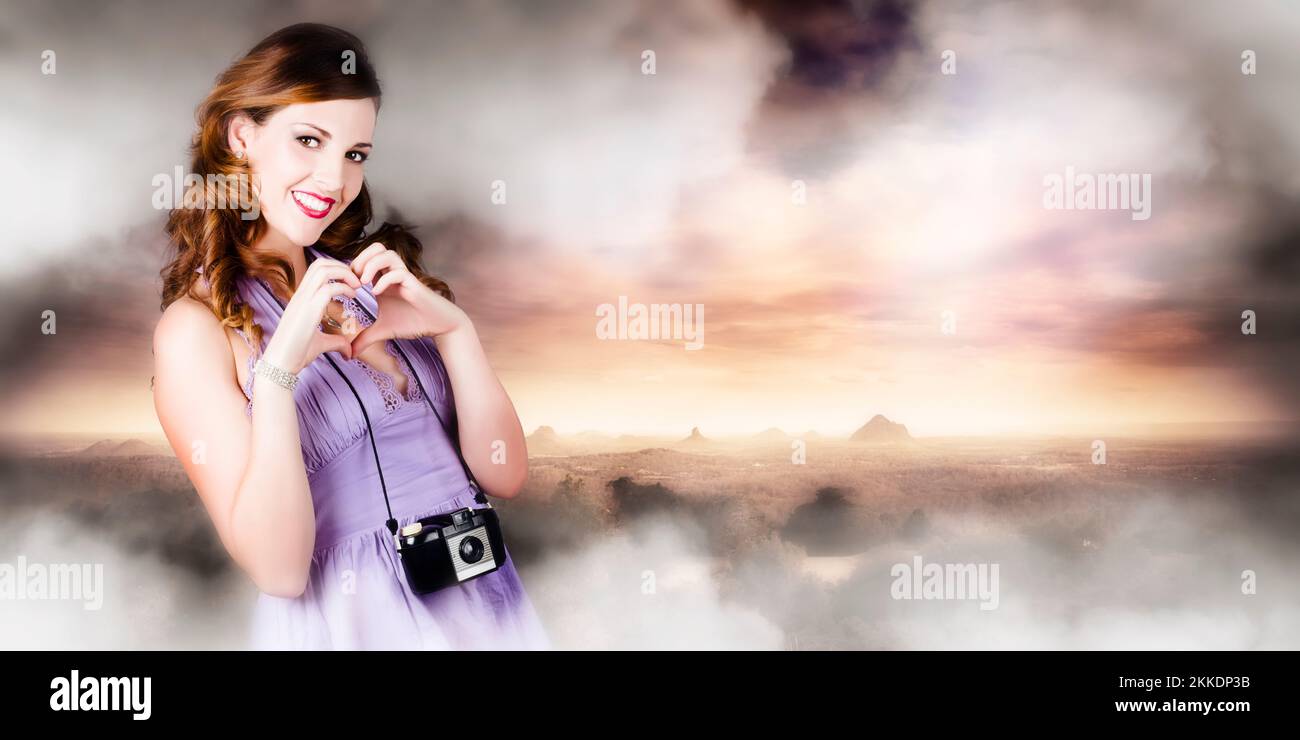 Lovely Female Photographer With Retro Camera Showing Heart Gesture When ...