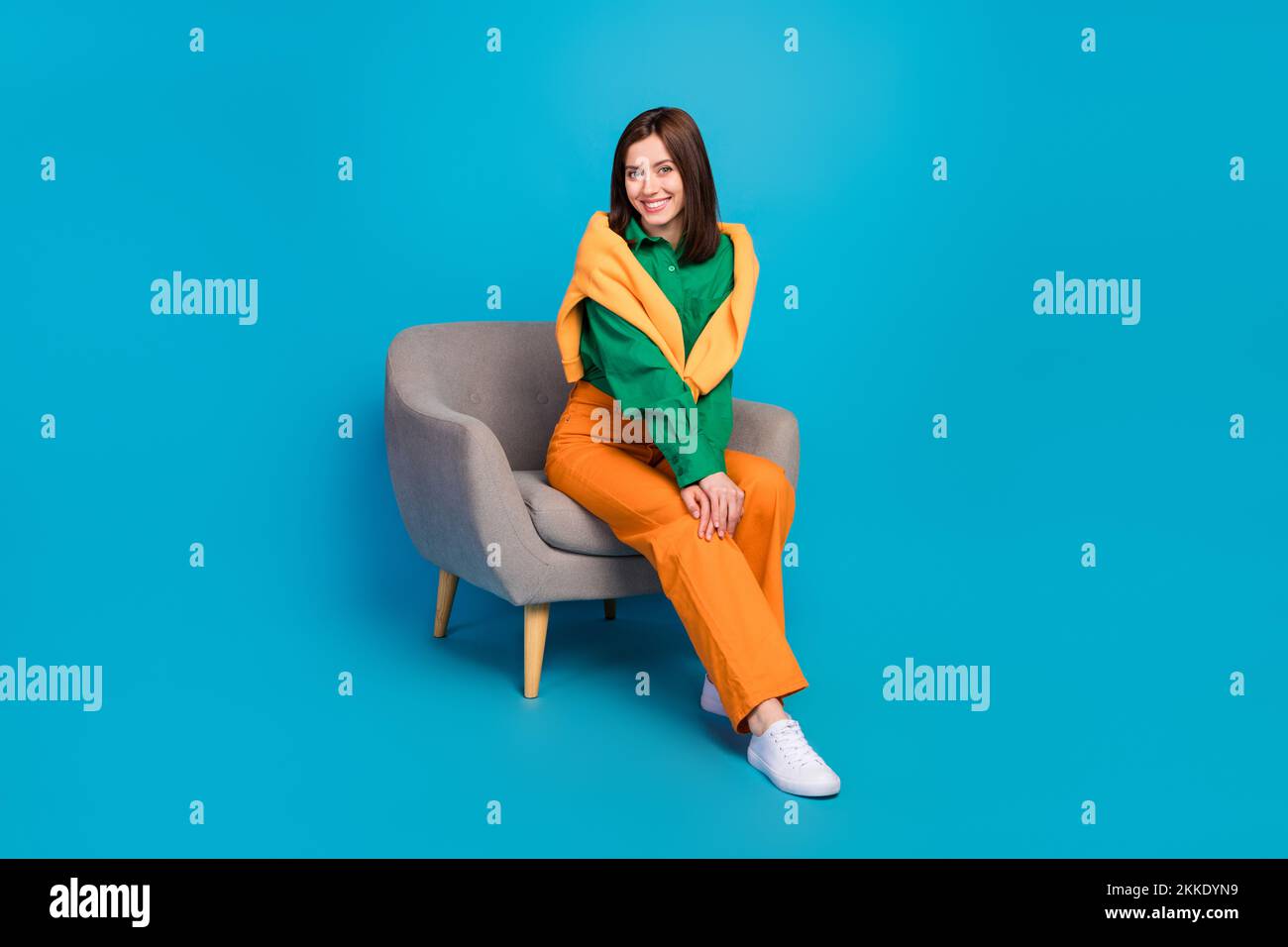 Full length photo of nice lovely satisfied girl sit chair toothy smile ...