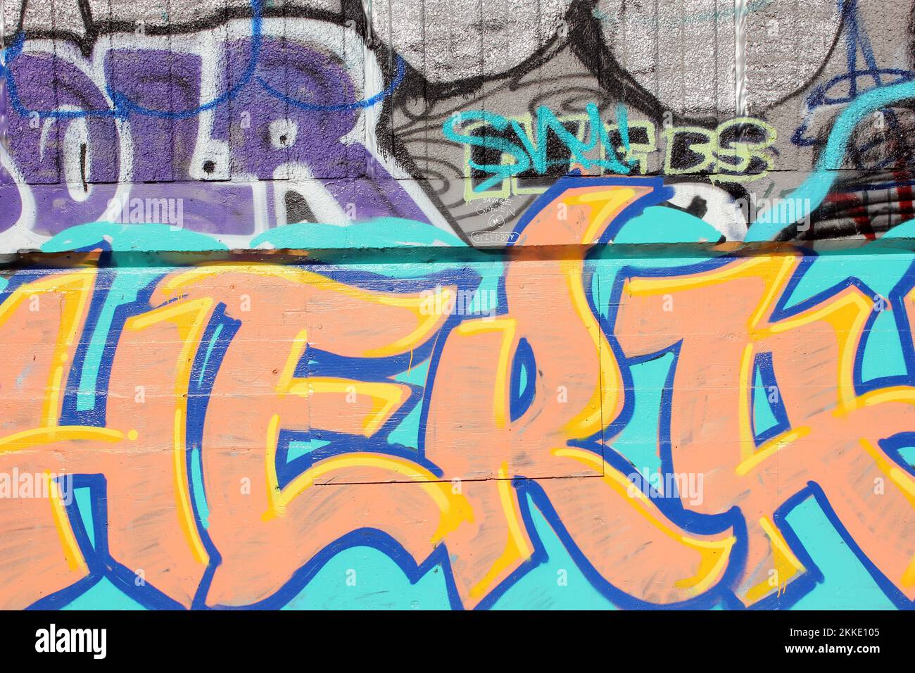 The graffiti on building wall Stock Photo - Alamy