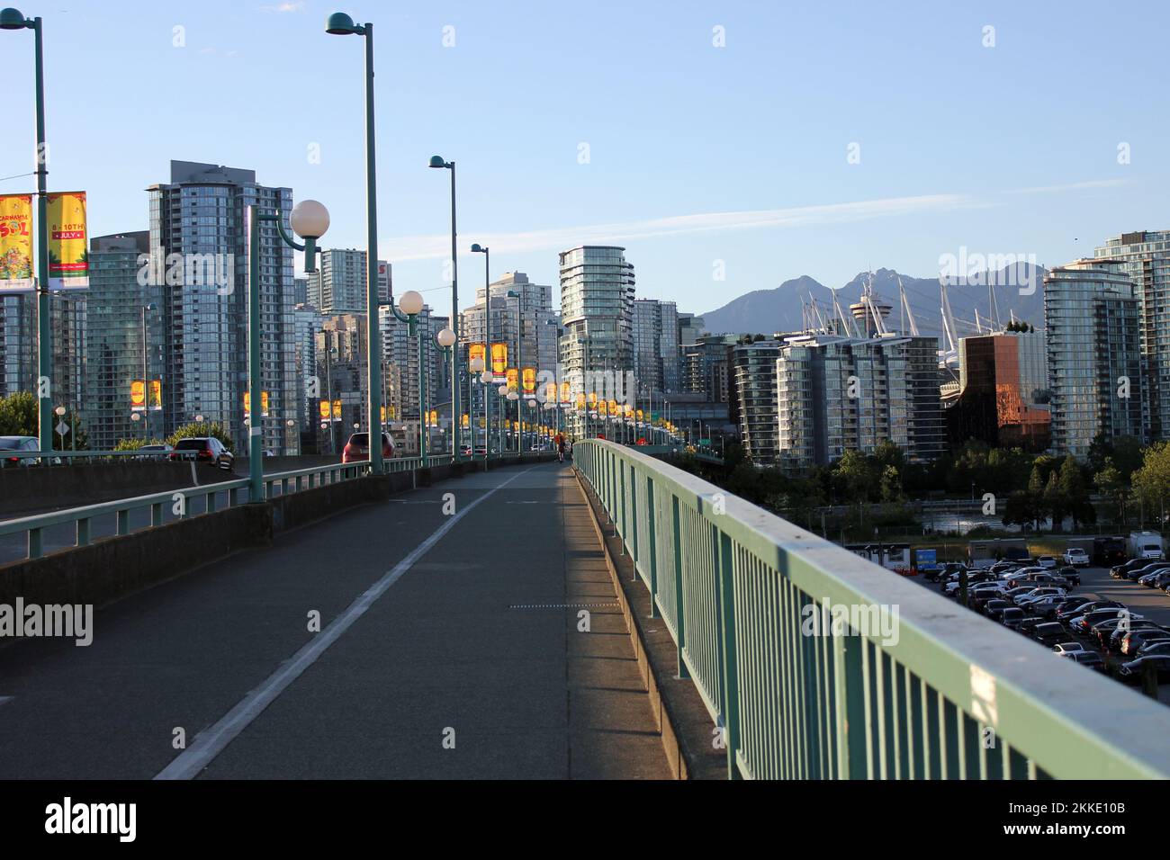 A Cambie bridge with buildings in the background Stock Photo - Alamy