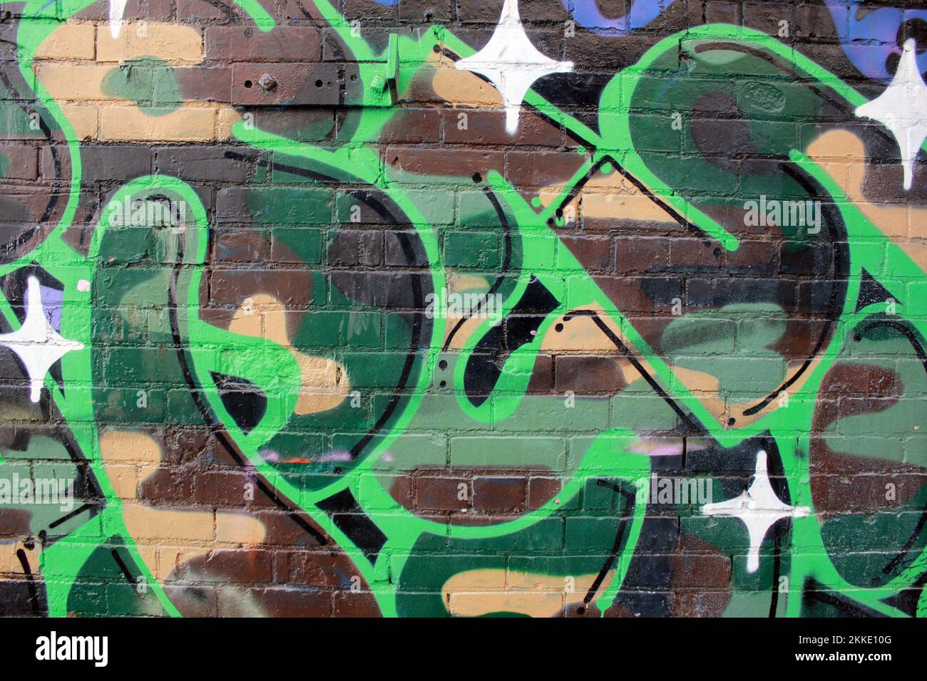 The graffiti on building wall Stock Photo - Alamy