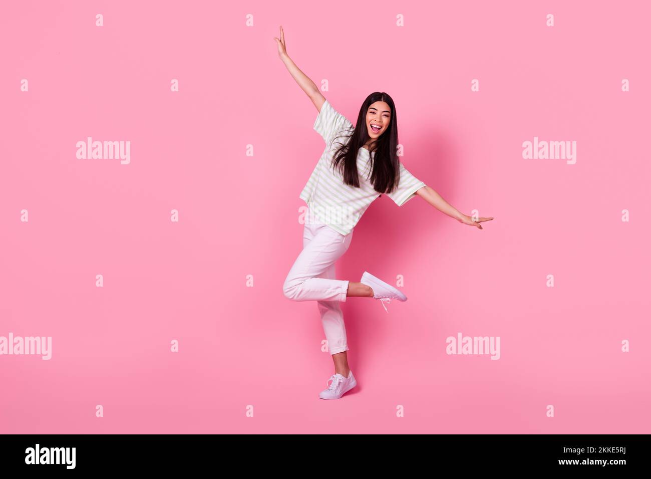 Full length portrait of positive pretty lady enjoy dancing arms wings ...