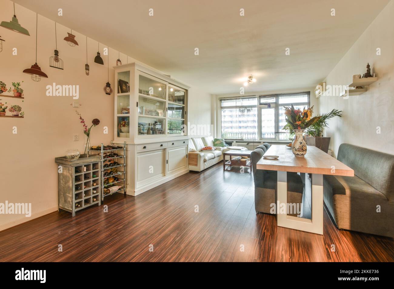 Counter with chairs dividing kitchen with modern furniture from dining ...