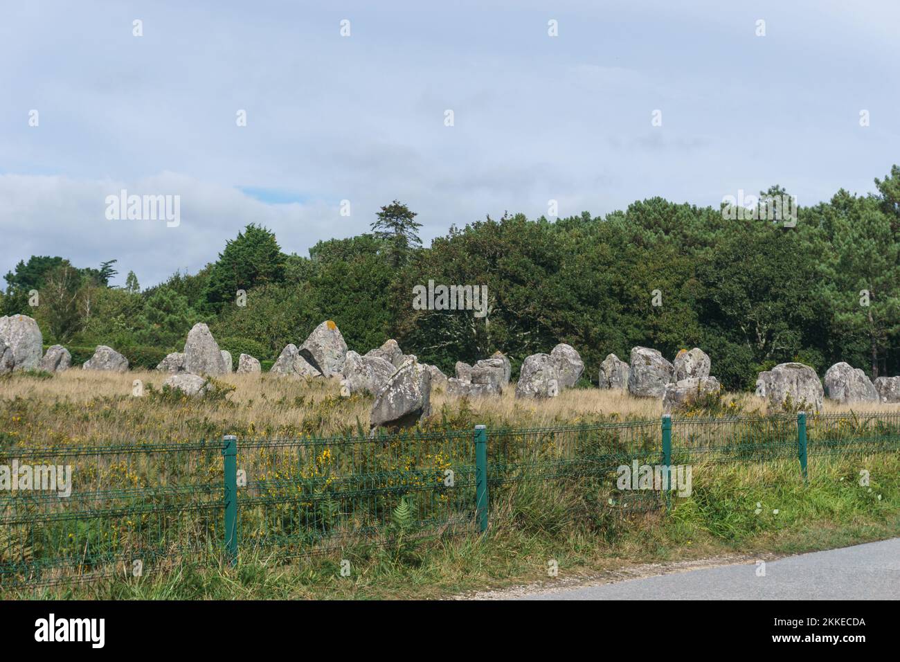 Miles long megalithic stones alignment on green meadow in Carnac ...
