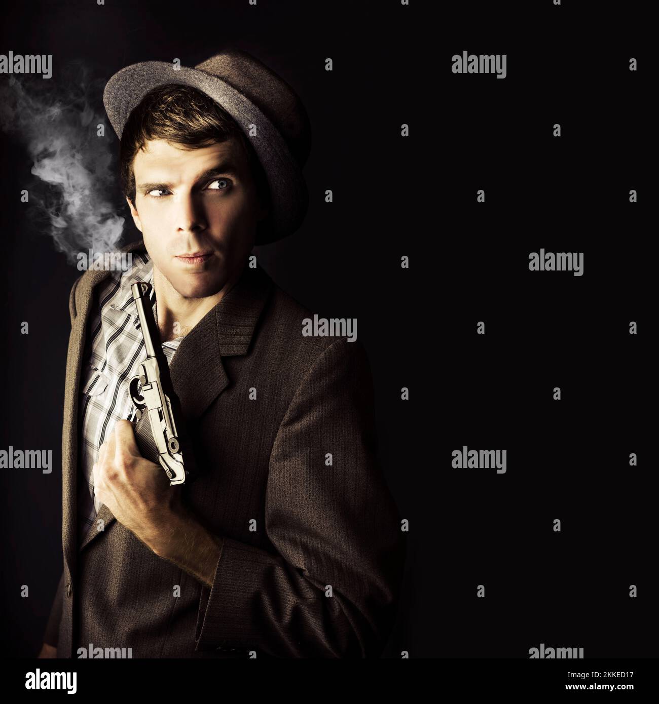 Dark Studio Image Of A Professional Hit Man Wearing Vintage Suit ...