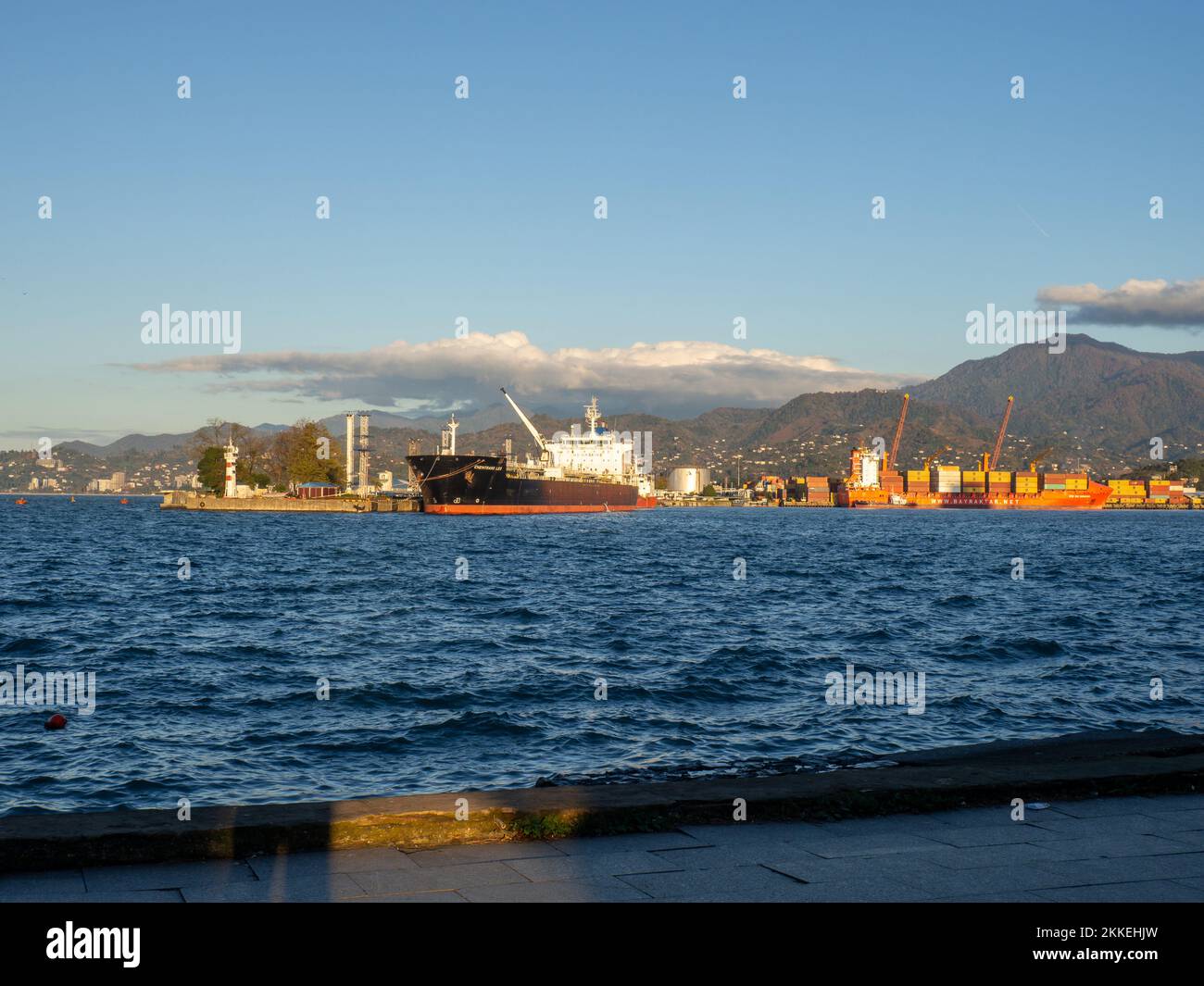Coastline in the seaport. Stone pier. Seaport elements. Pier for boats ...