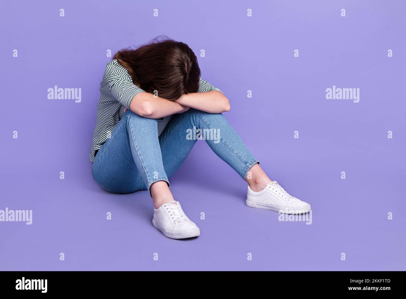 Photo of sad upset lady sitting floor hiding head face crying bad mood ...