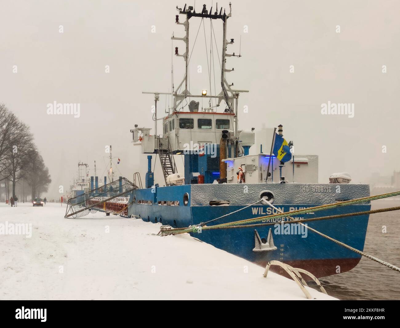 A blue ship at a winter day in Rotterdam Stock Photo - Alamy