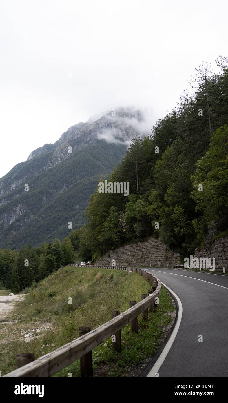 A Slovenian mountain trail with clouds and forest trees Stock Photo - Alamy