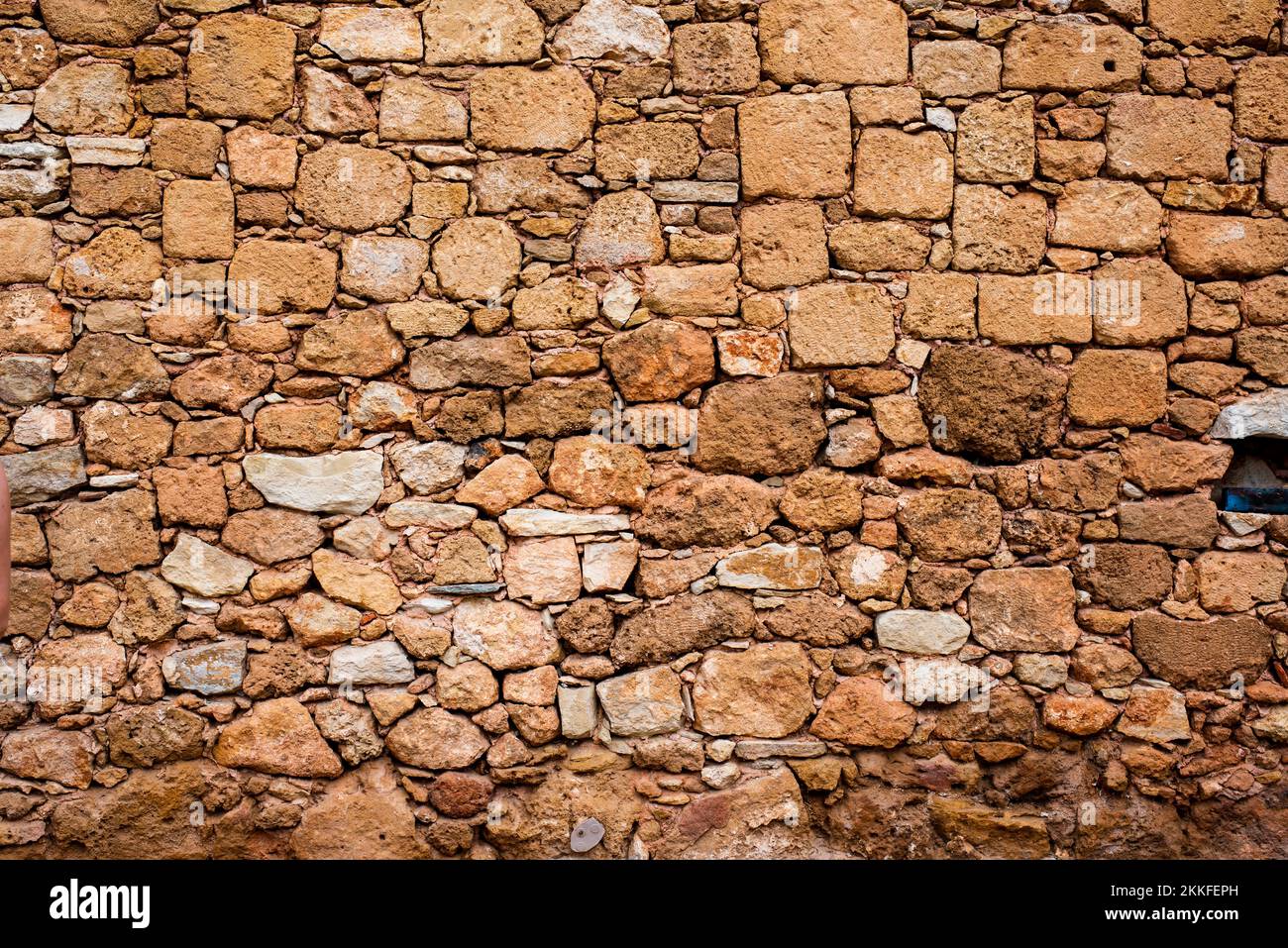 Background. Stone wall. Yellow bricks. Yellow stones wall. pattern ...