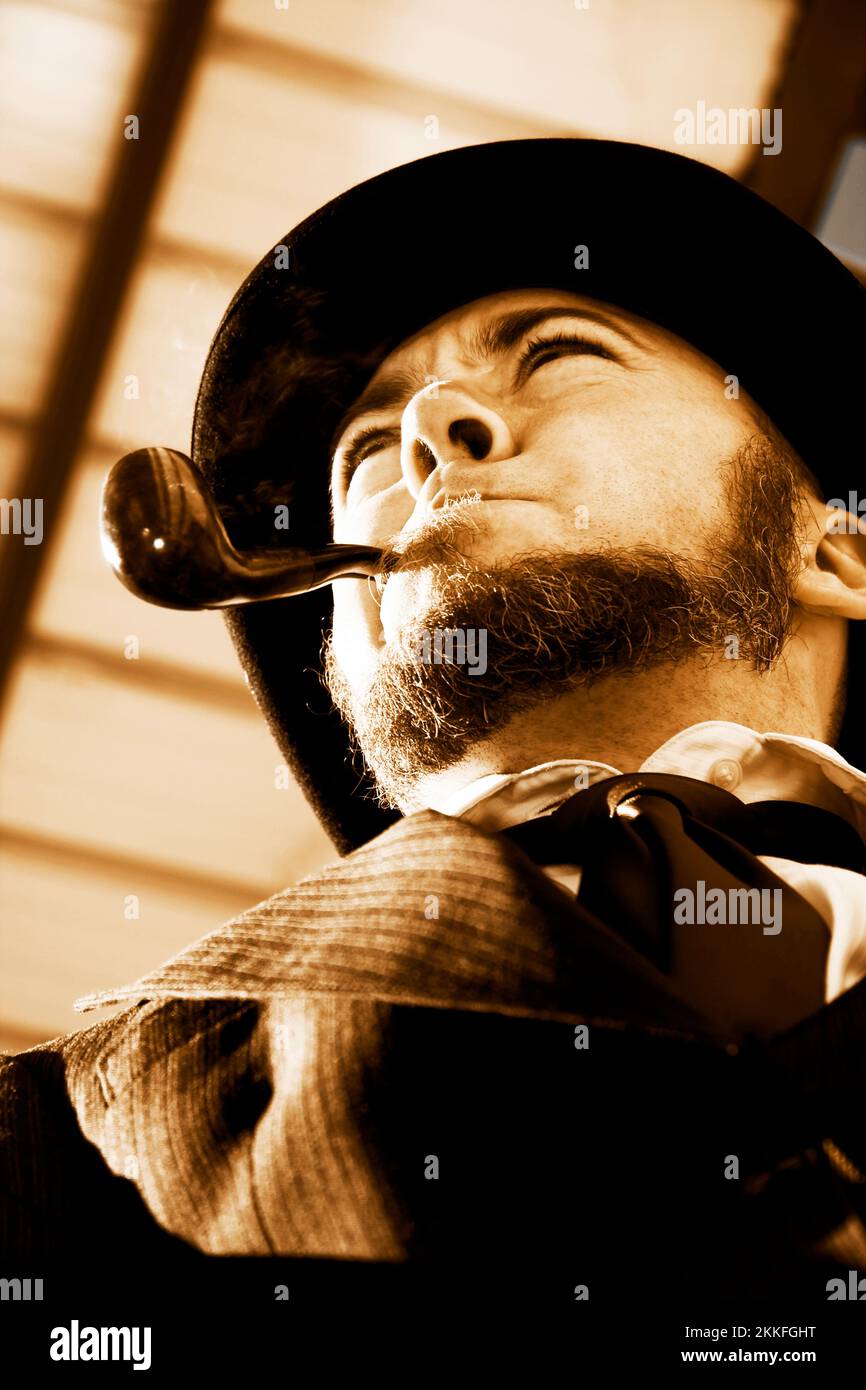 Man smoke smokes smoking smoker pipe hi-res stock photography and ...