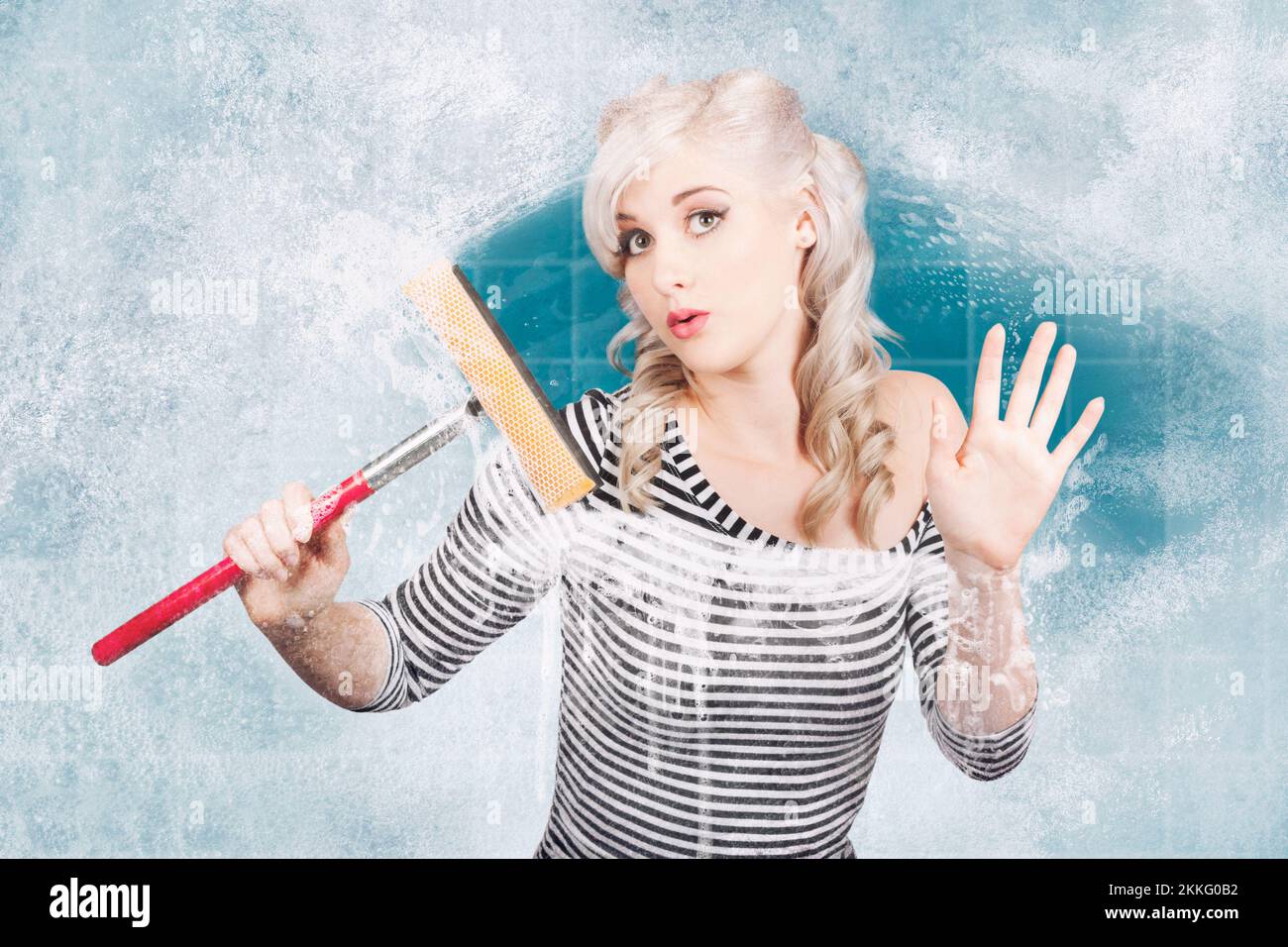 Pinup girl woman housewife cleaner hi-res stock photography and images ...
