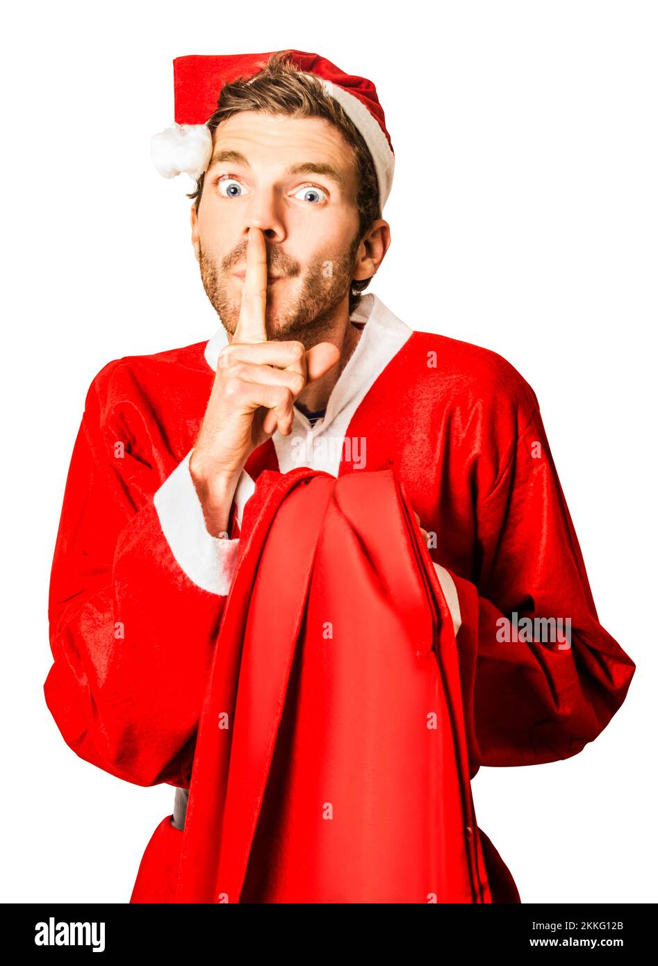 Isolated secret santa whispering a gesture of quiet while sneaking ...