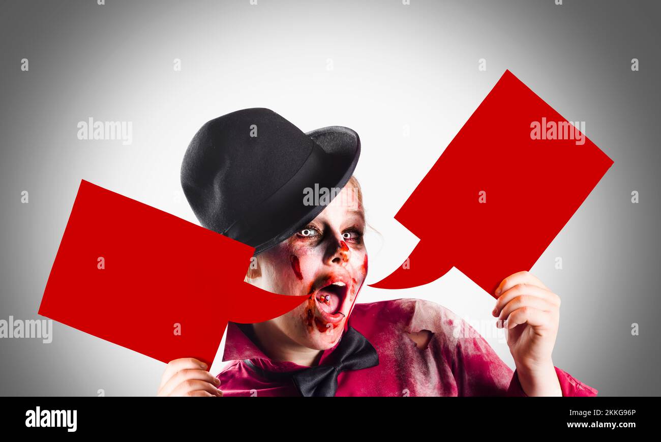 Frightening halloween girl covered in cuts and scuff marks shouting out ...