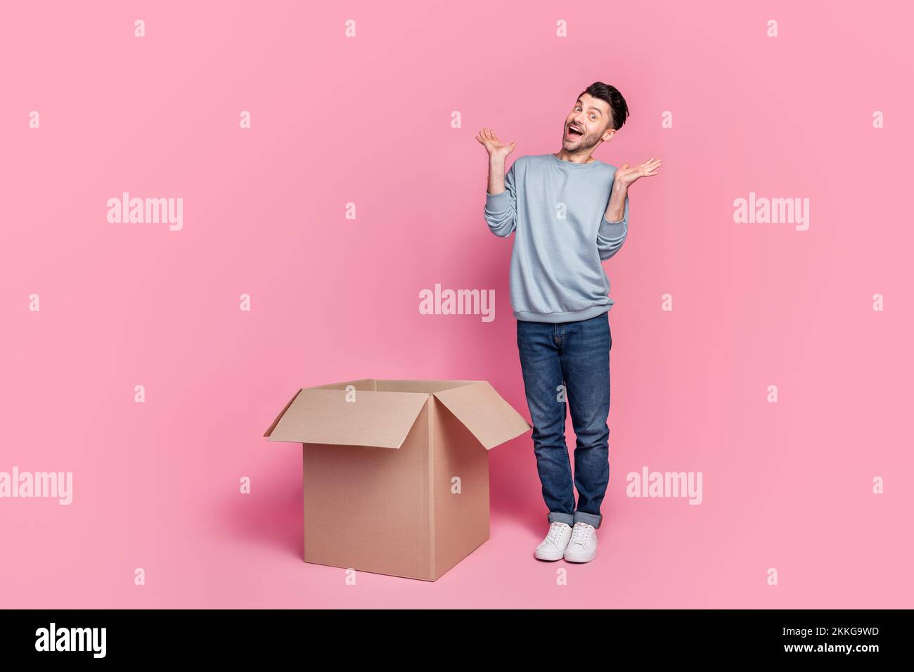 Full body photo of nice young man raise hands admire receive present ...