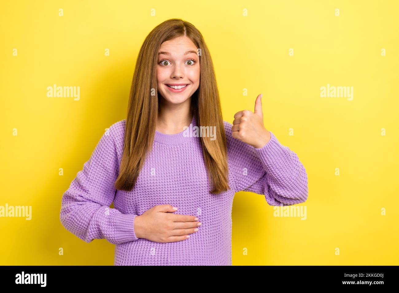 Photo of positive satisfied lady wear trendy knitted sweater hand touch ...