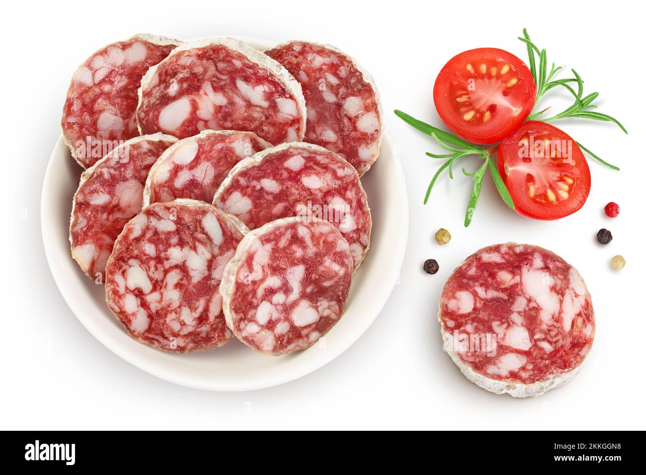 Cured salami sausage in ceramic bowl isolated on white background ...