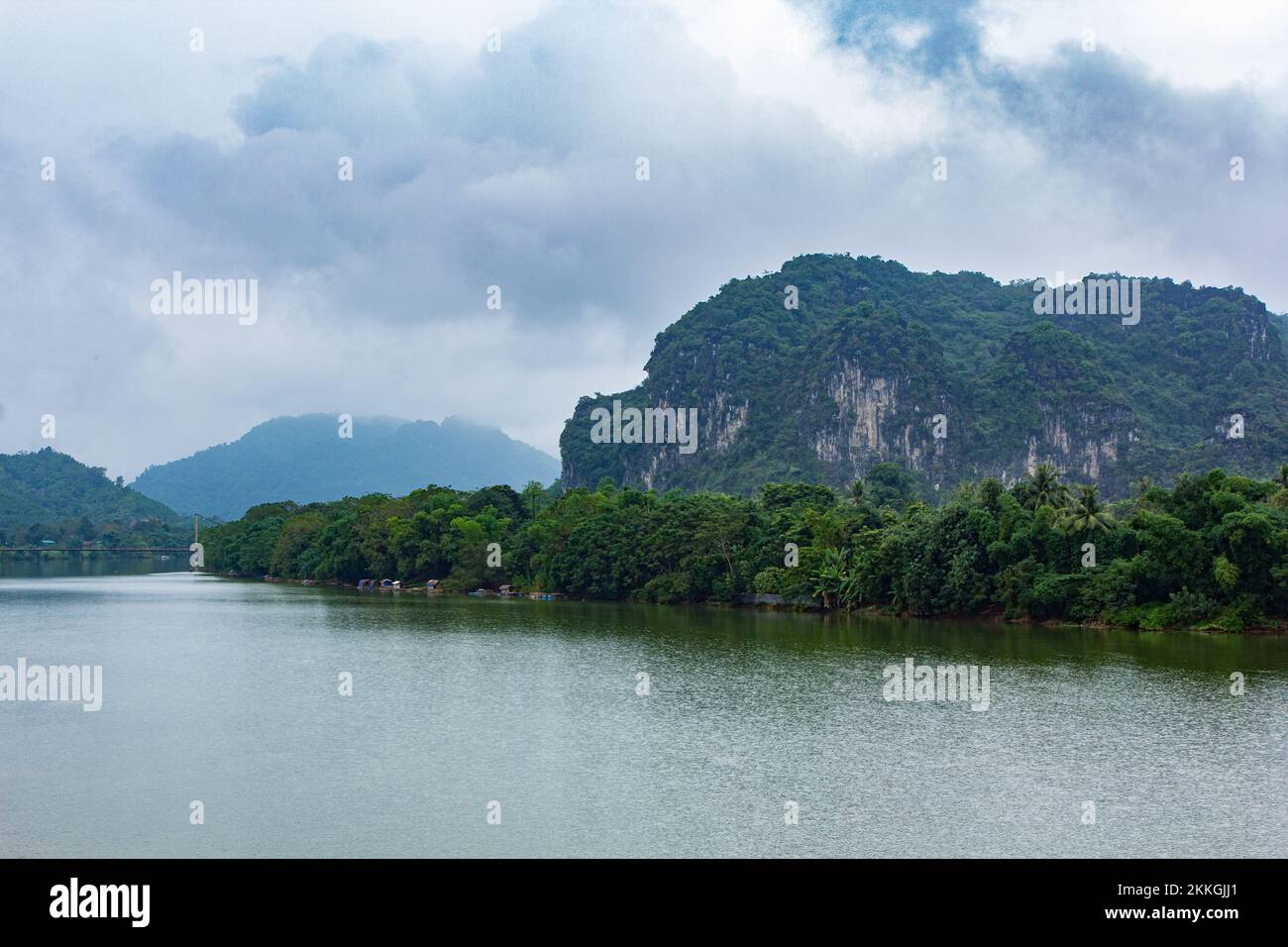 Mountain on the riverside Stock Photo - Alamy