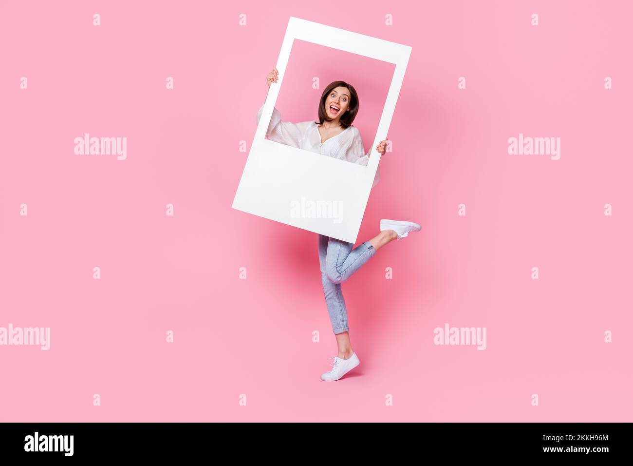 Full length photo of positive pretty lady hand hold white paper image ...