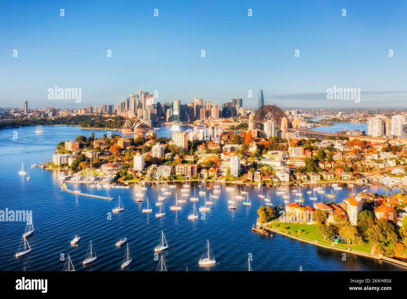 Local yacht marina on Lower North Shore Sydney Harbour against Sydney ...