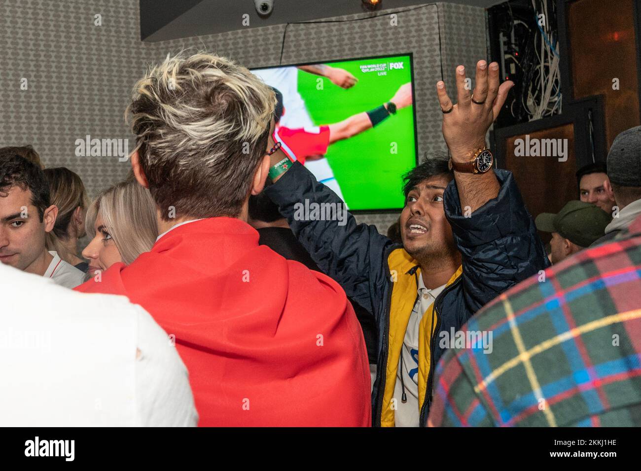 Fans of USA and England football teams cheer during their match at ...