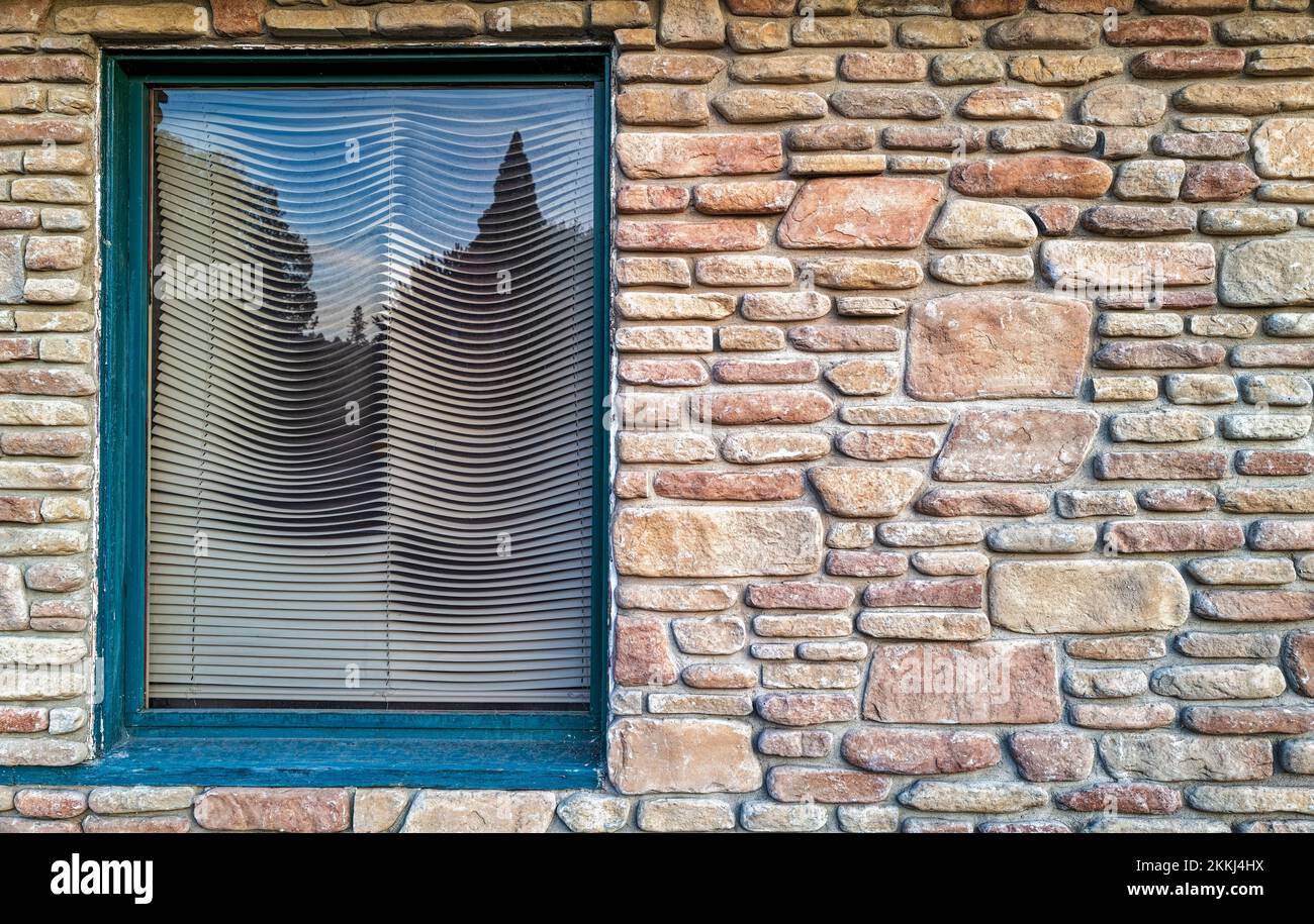 Window with bent blinds on the stone wall of a building Stock Photo - Alamy