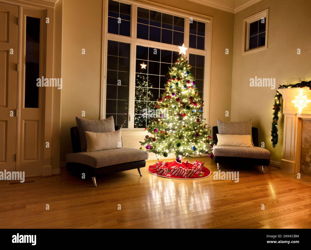 Bright Christmas with shiny lights in front of home window during the ...