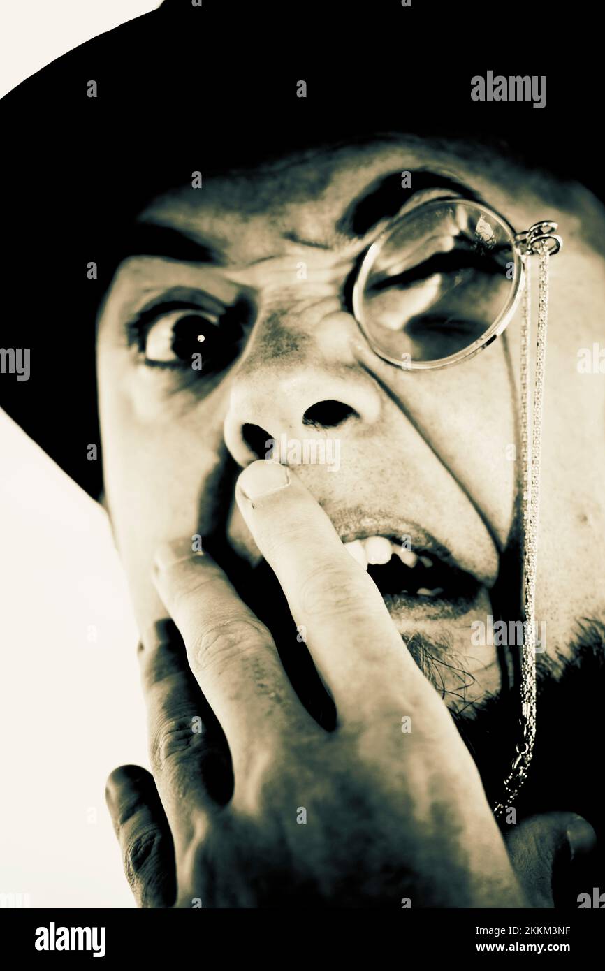 Focus On The Face Of A Vintage Man With A Monocle Gasping With A B ...