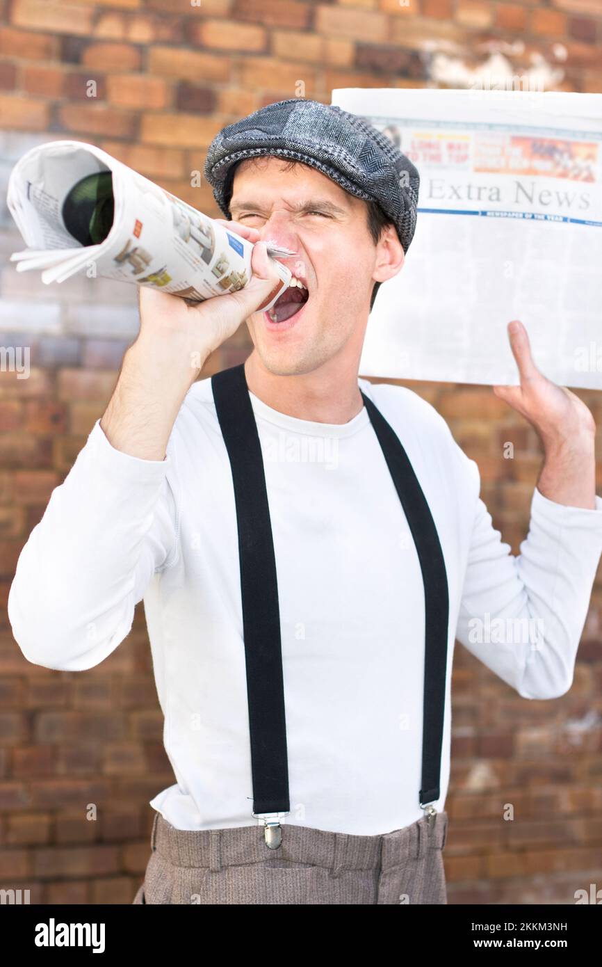 News boy selling newspaper hi-res stock photography and images - Alamy