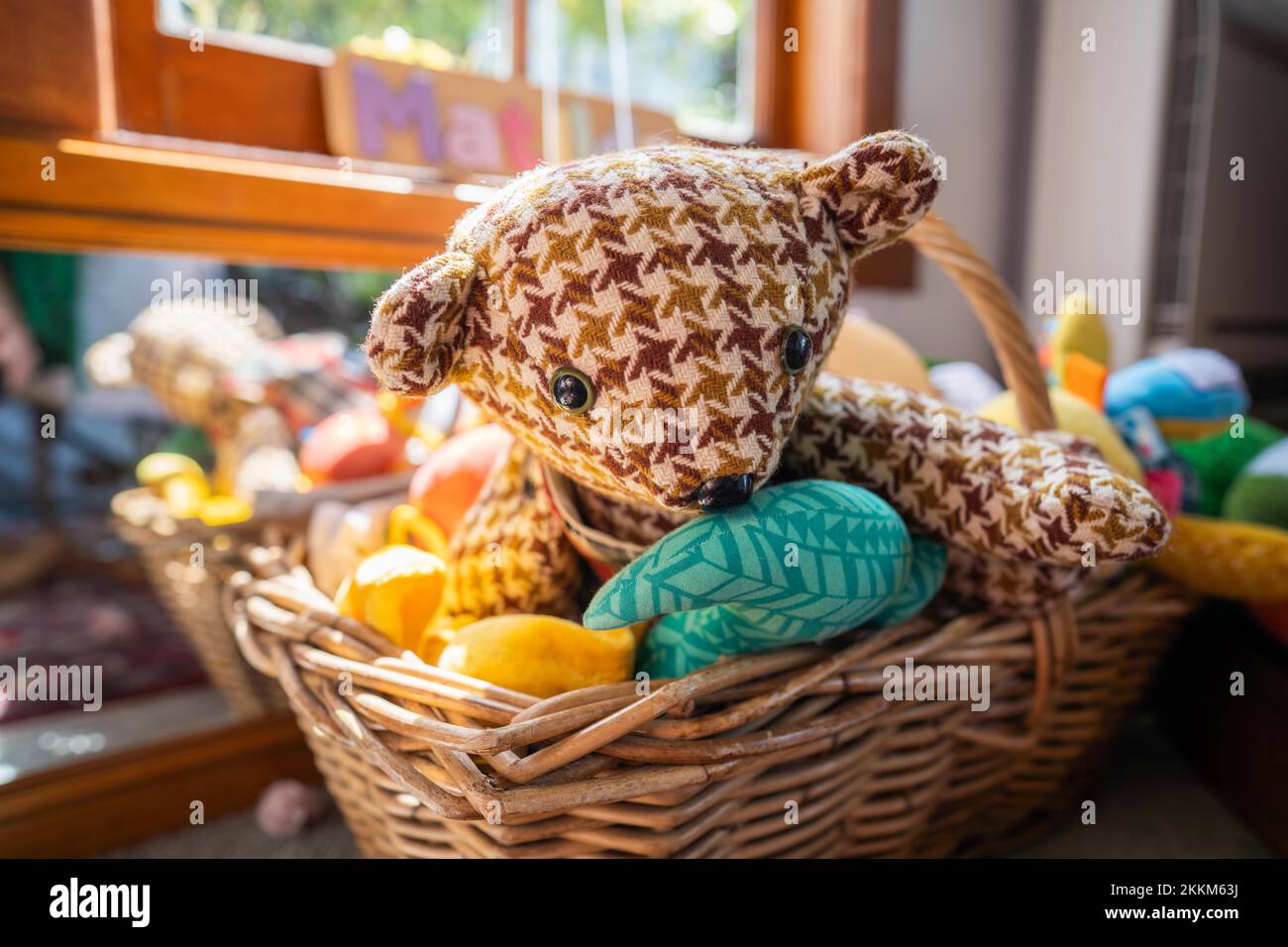 cute teddy bear in a toy basket in australia Stock Photo - Alamy