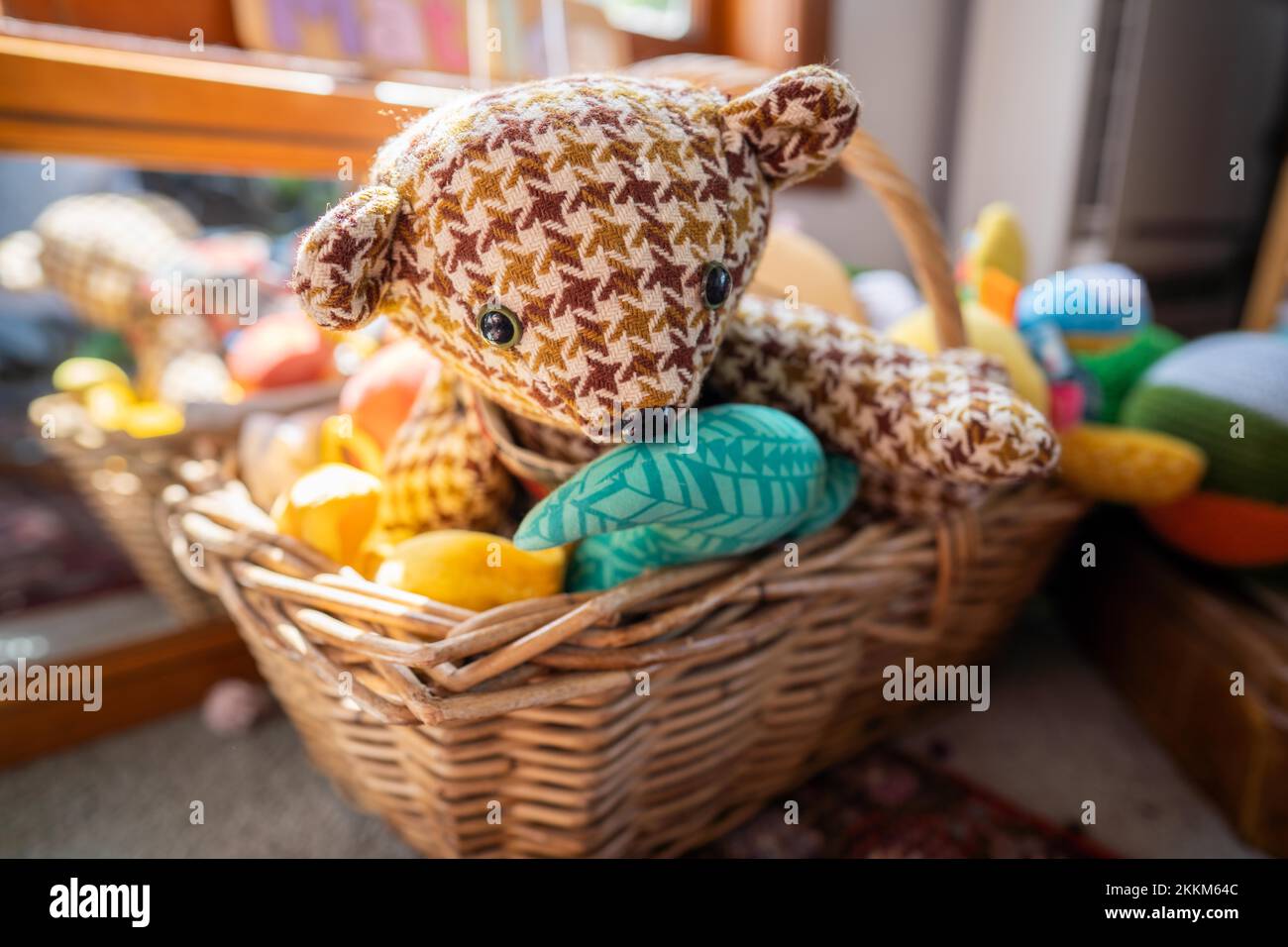 cute teddy bear in a toy basket in australia Stock Photo - Alamy