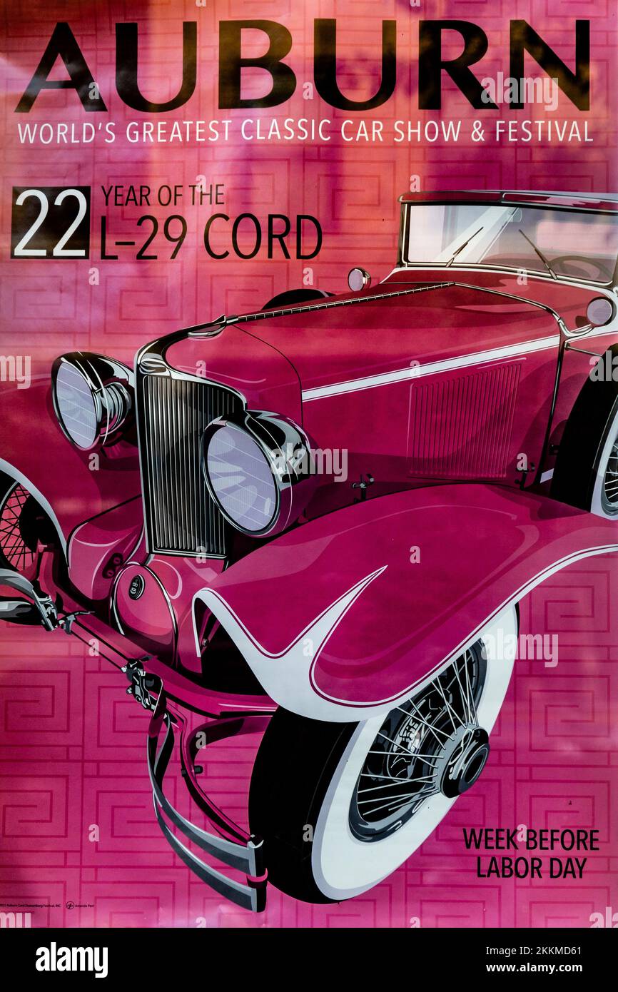 The pink 2022 Auburn Cord Duesenberg Festival poster featuring a Cord L ...