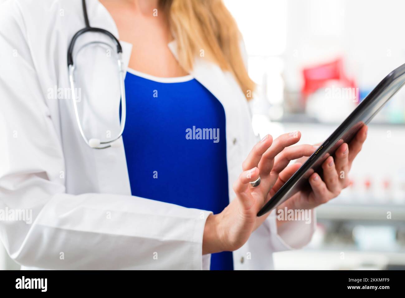 Doctor using digital tablet Stock Photo - Alamy