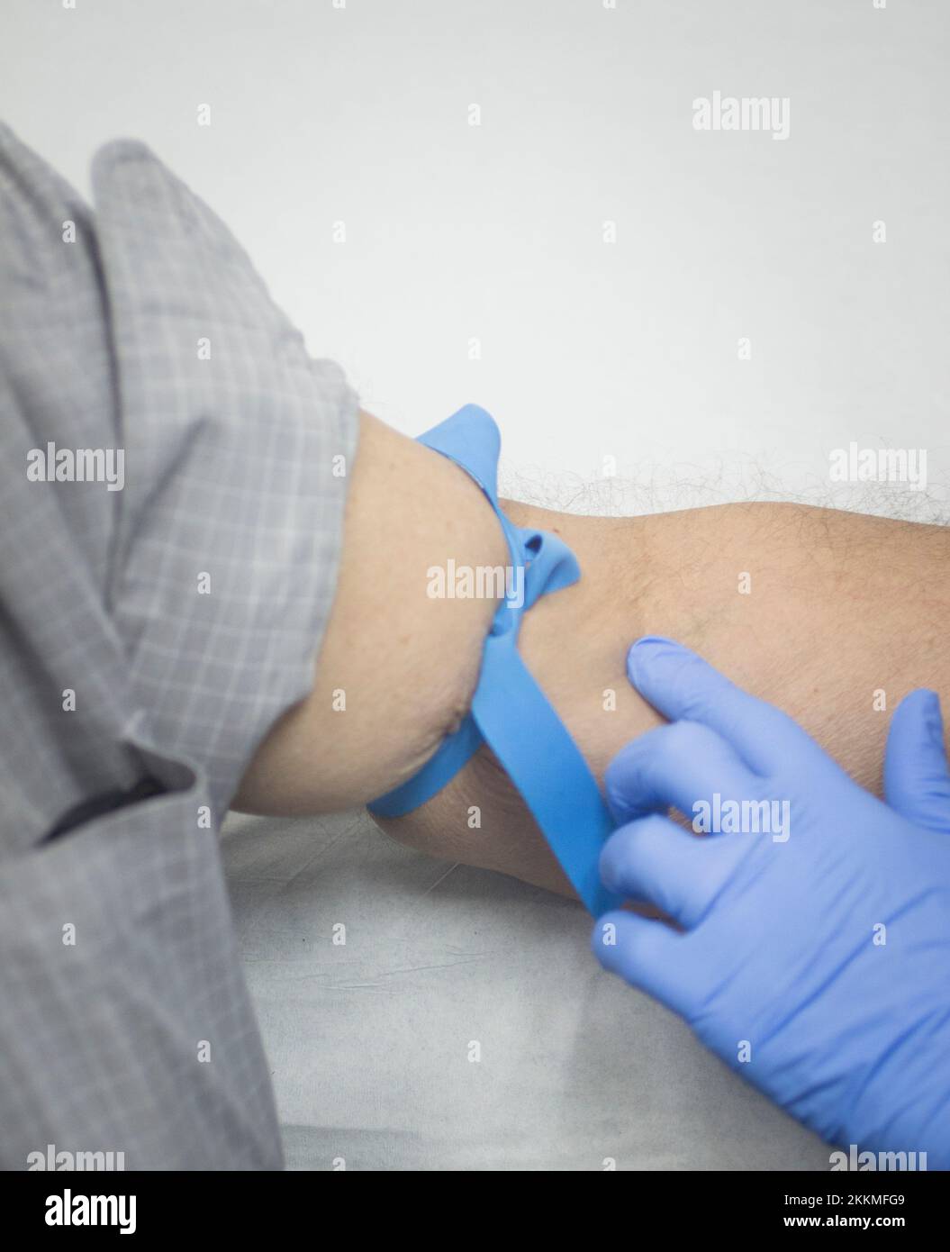 Taking blood sample Stock Photo - Alamy