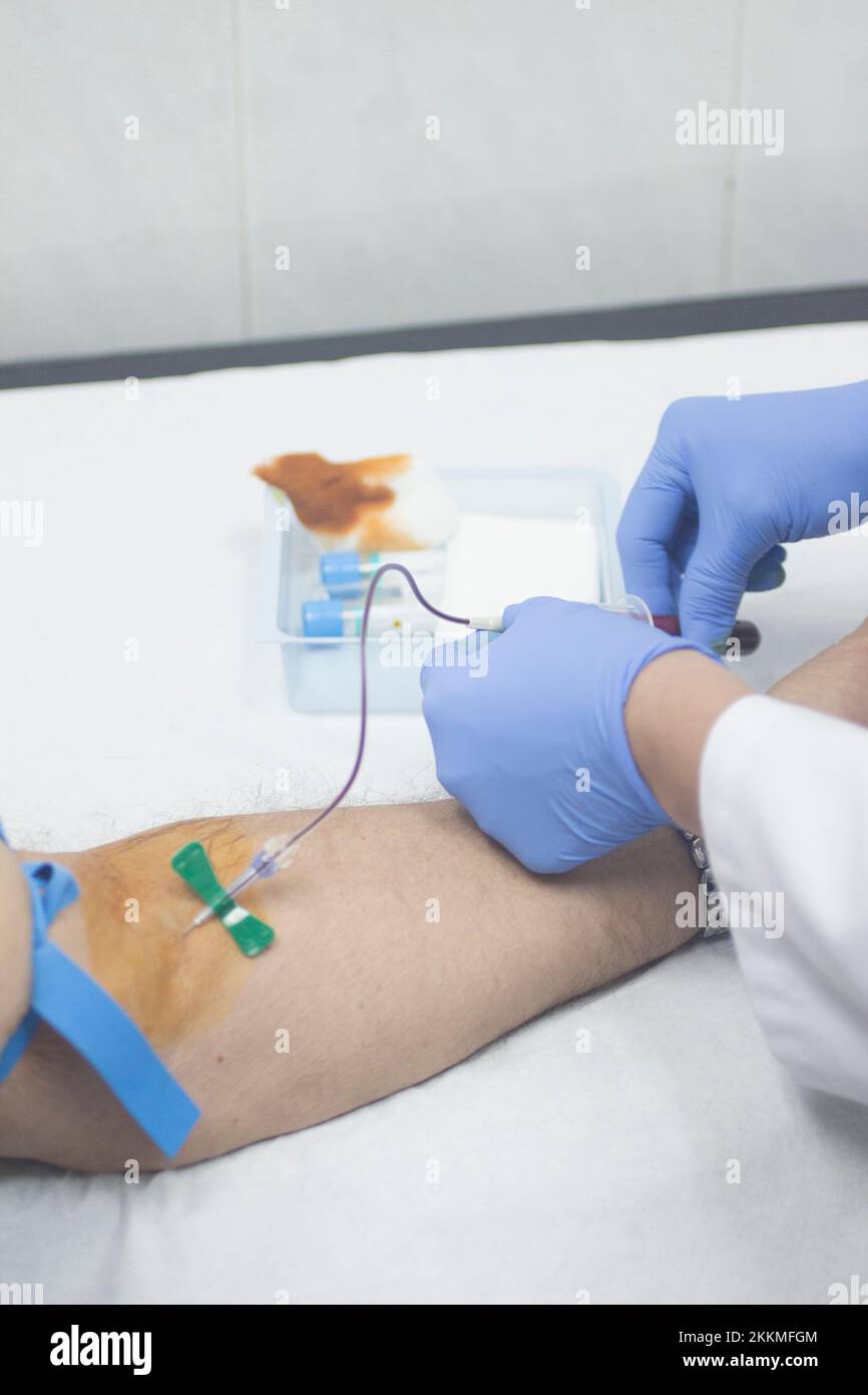 Taking blood sample Stock Photo - Alamy